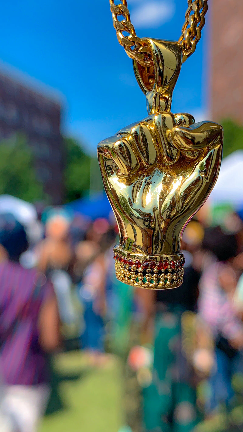 Black power fist necklace store